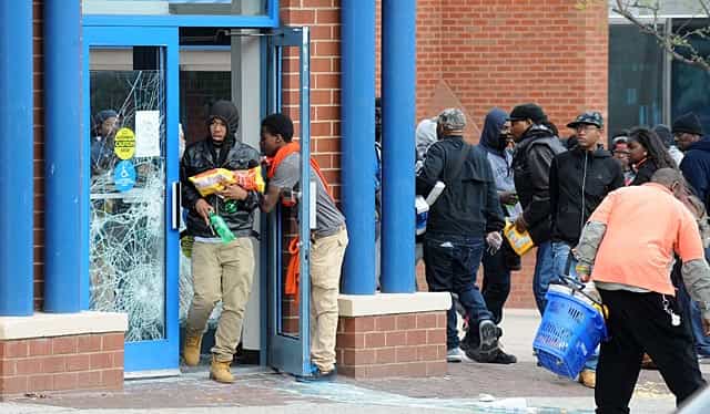 Baltimore: Race riots after funeral of black man; emergency declared ...