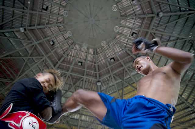 Women are game for Myanmar's ferocious kickboxing style | World News