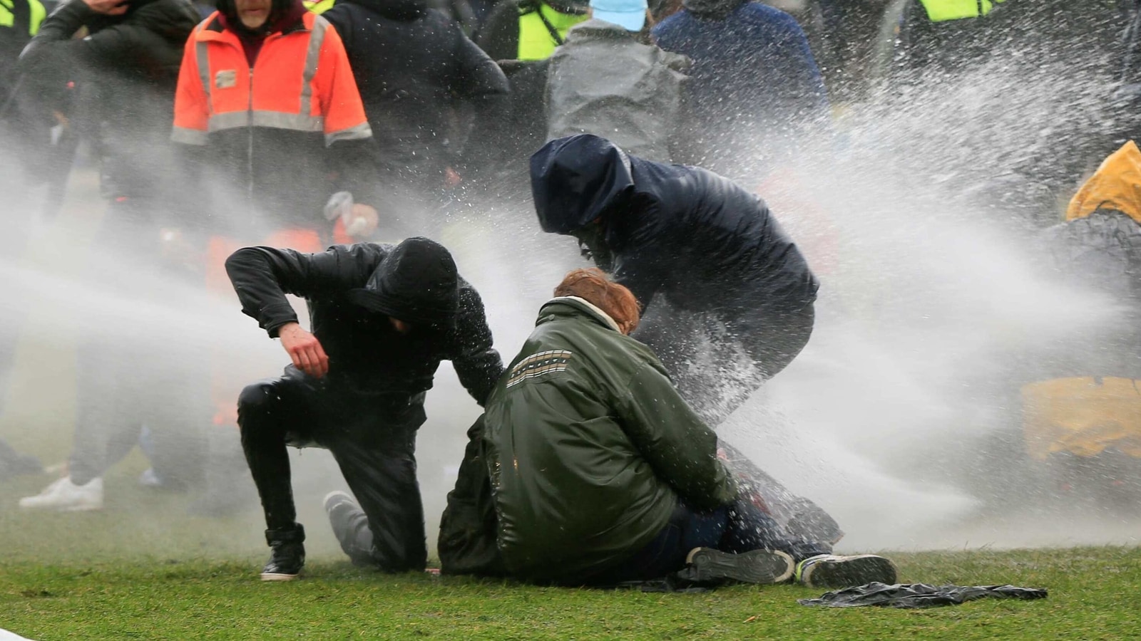 Dutch police clash with anti-lockdown protesters in 2 cities | World News