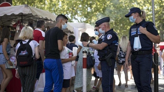 France passes security law allowing off-duty police officers to carry ...