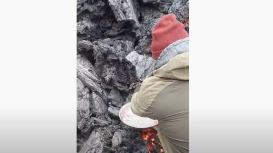 Man cooks eggs on molten lava of live volcano, shares video on YouTube ...