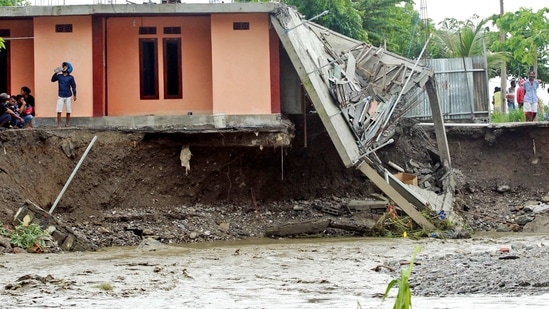 More than 75 dead in Indonesia, East Timor floods, dozens missing ...