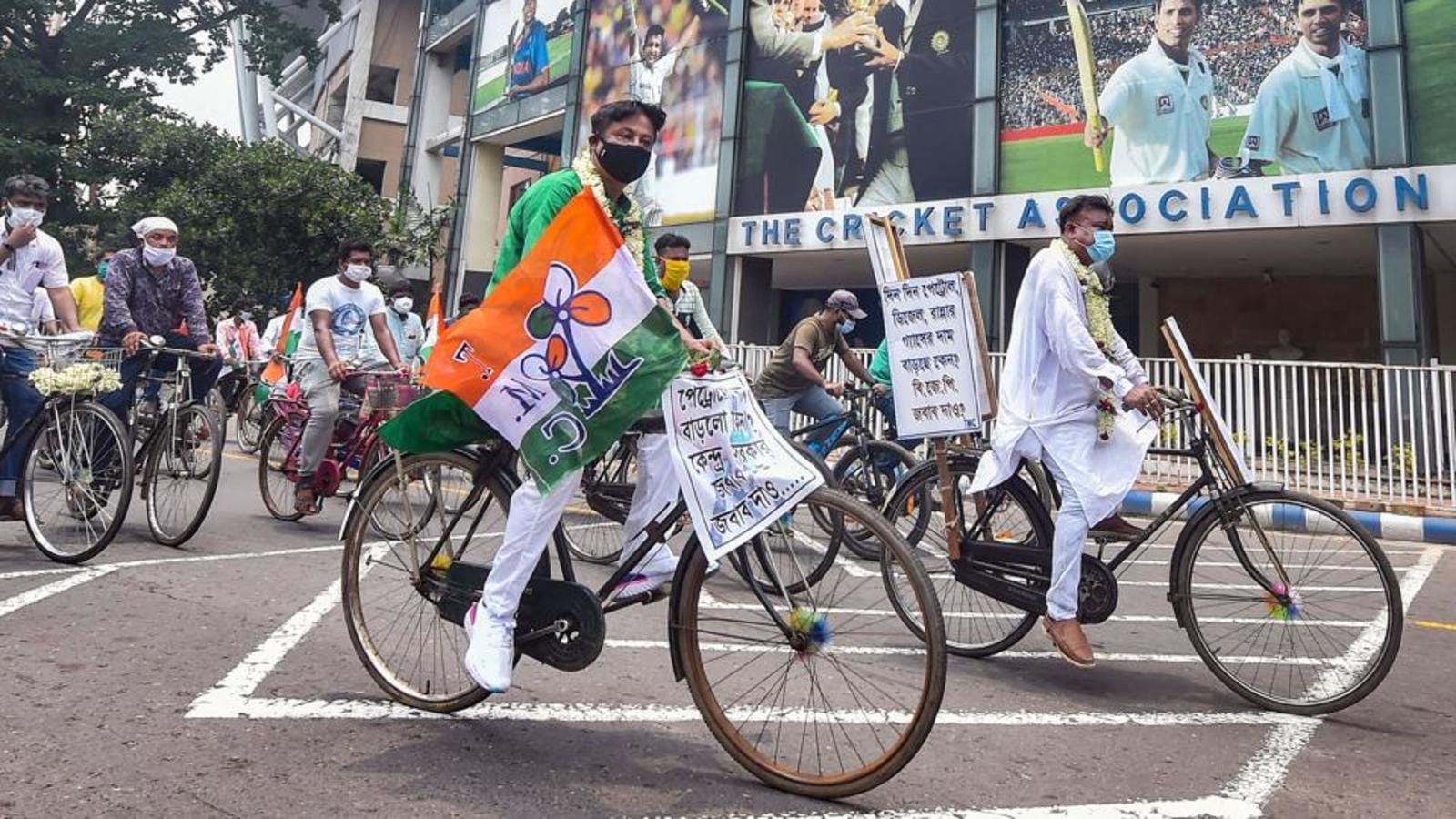 Bengal minister cycles 40km to reach assembly to protest fuel price ...