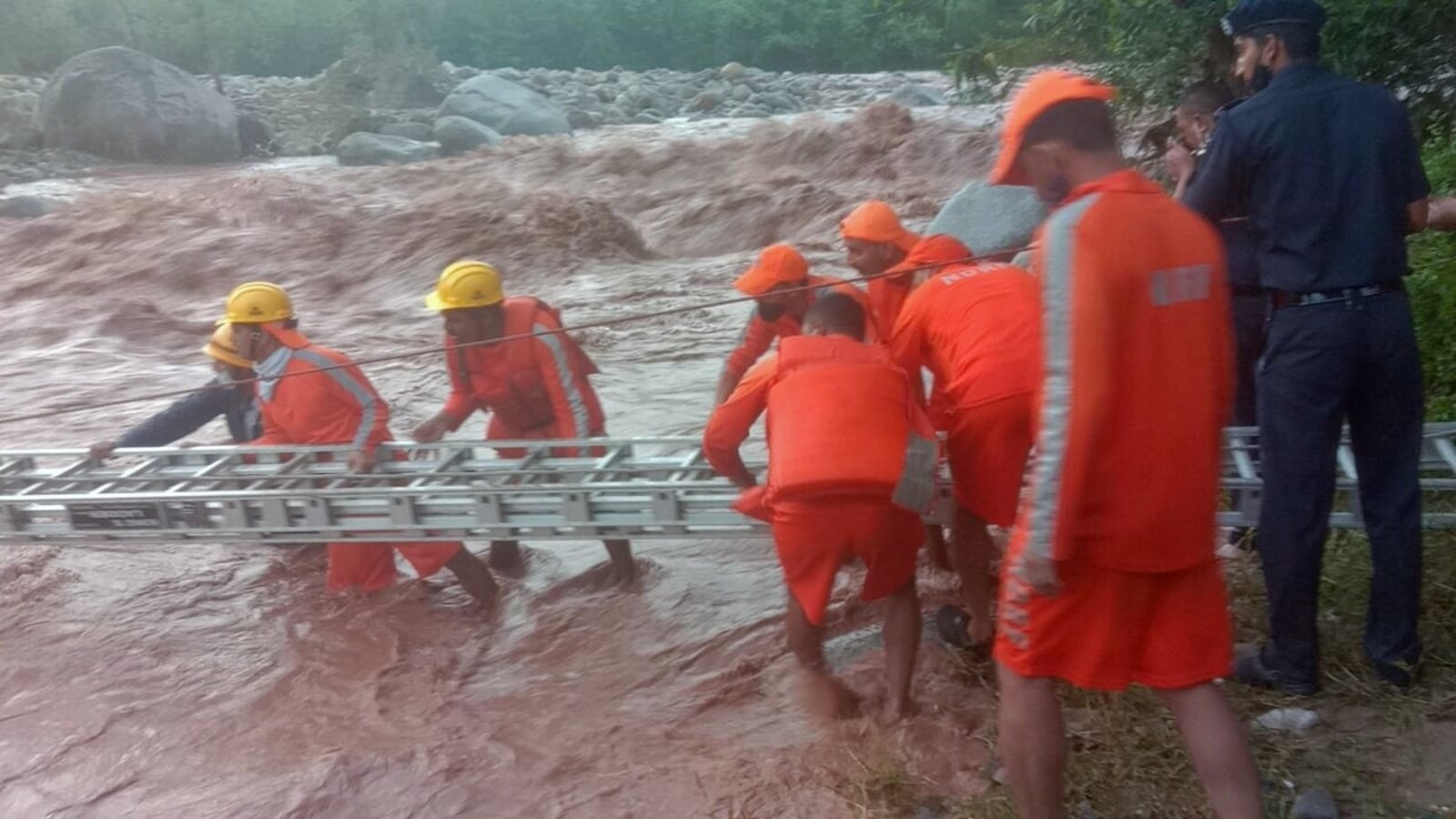 Watch: Himachal villager, trapped in flash flood, rescued by NDRF ...