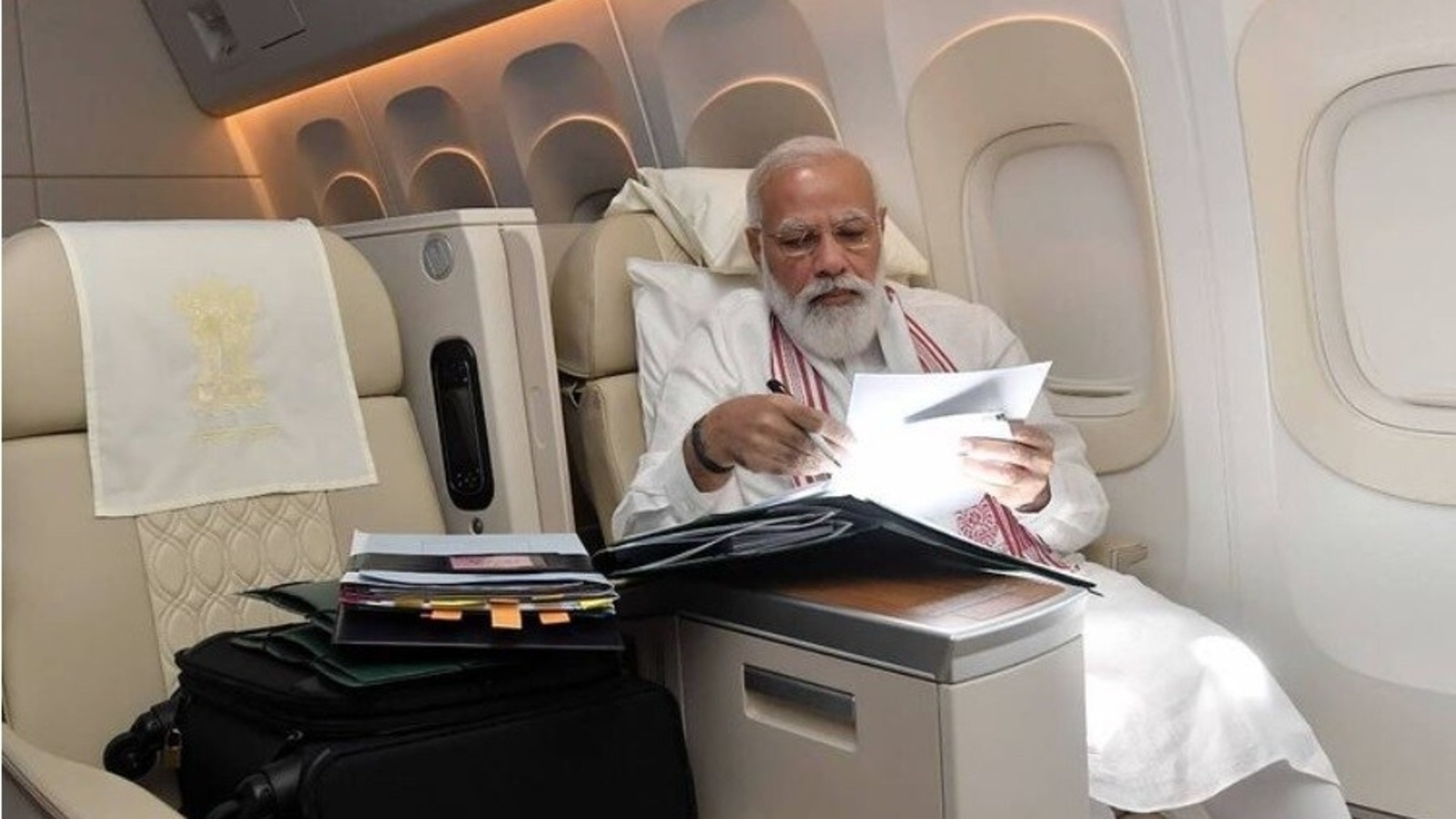 Files Paper Work How PM Modi Spent Time On long Flight To The US