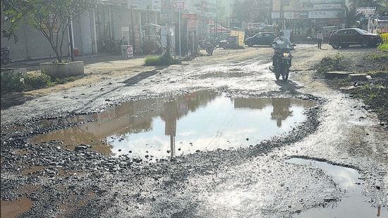Residents irked over damaged Porwal road in Dhanori | Hindustan Times
