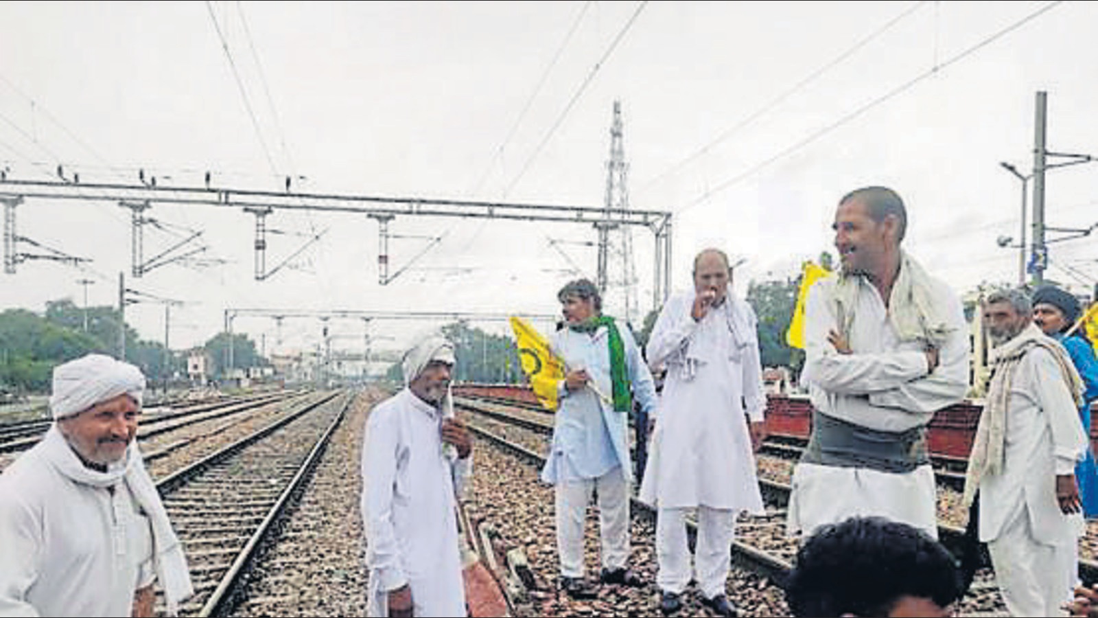 Rail roko: Farmers stage protest on rail tracks in western Uttar ...
