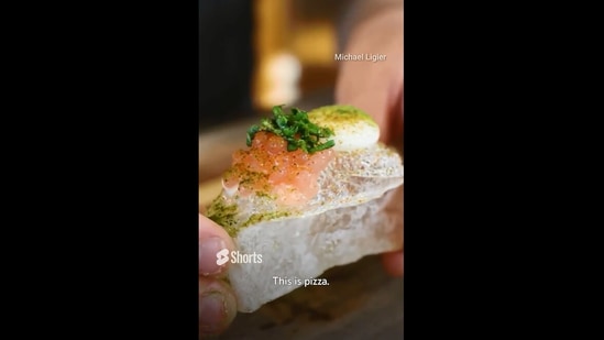 Man cooks ‘invisible pizza’, eats it. Video intrigues people | Trending