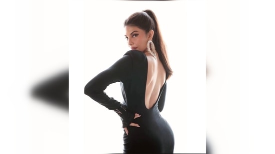 Jacqueline Fernandez in backless black bodycon dress will raise your ...