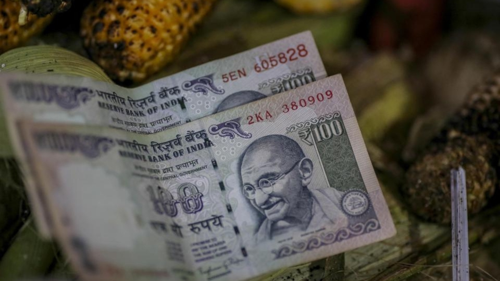 Rupee hits record low of 77.18 against US dollar as broad risk-off ...