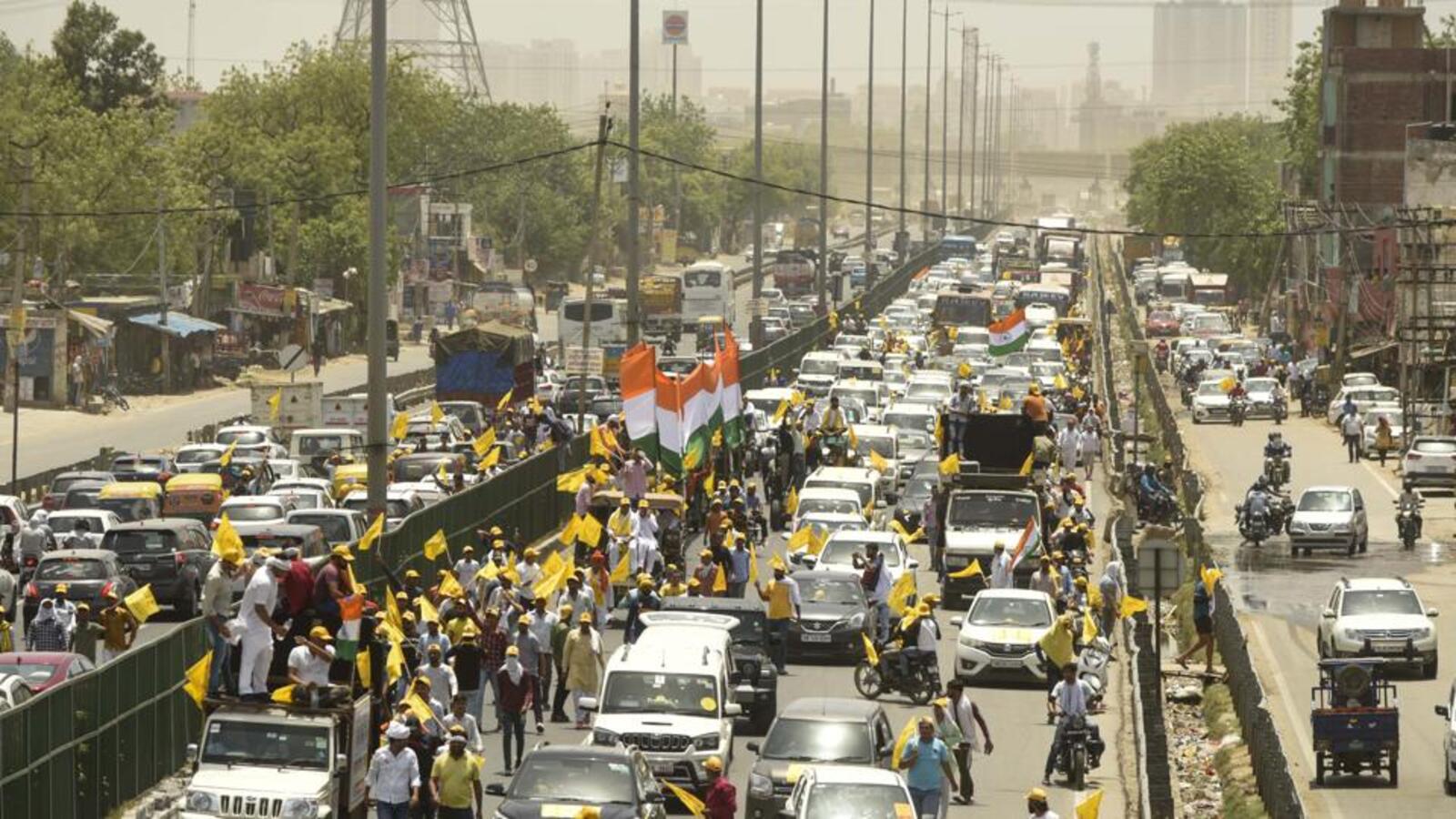 Protestors create ruckus on road, block traffic , damage car ...