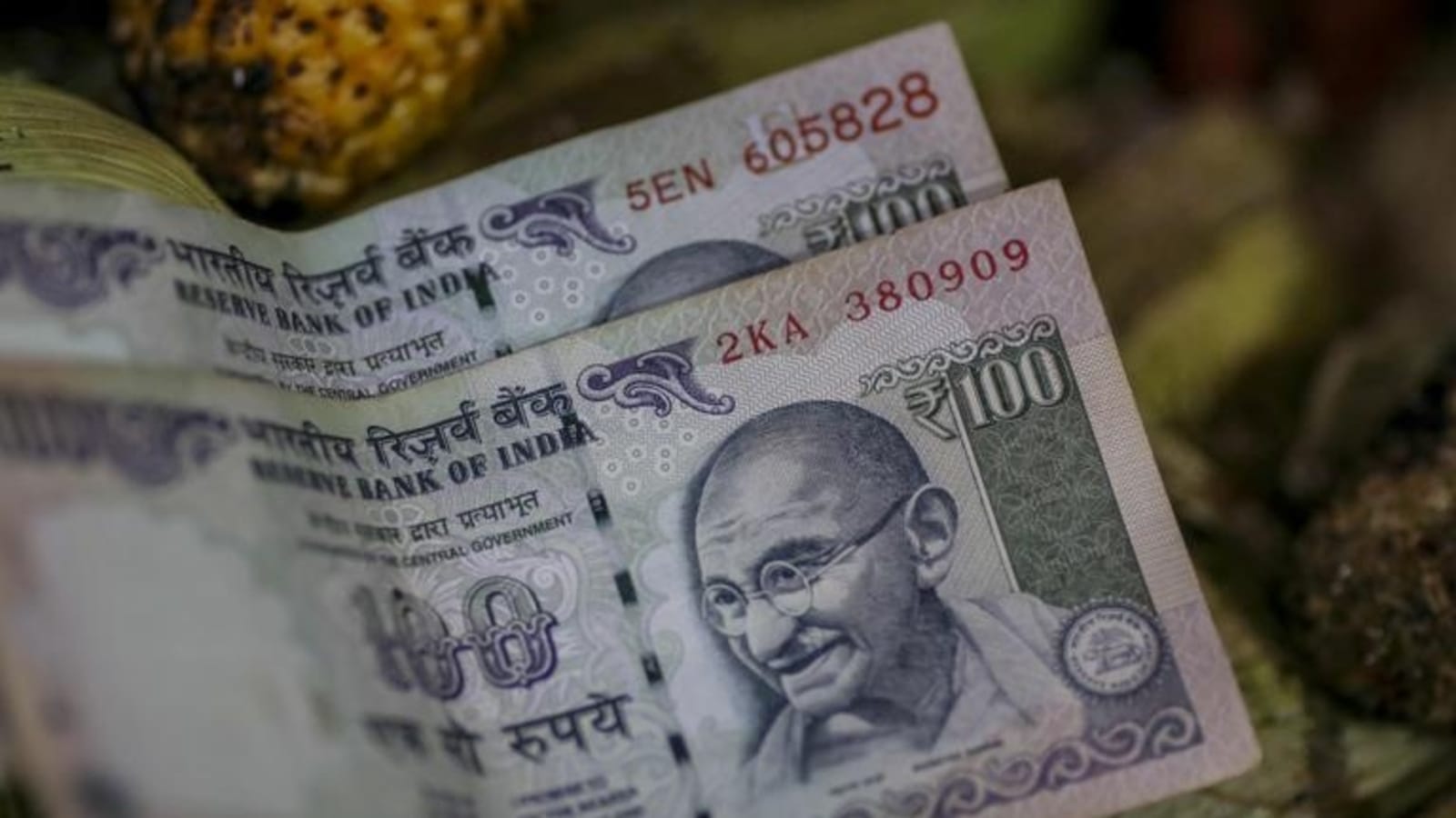 Rupee slumps 10 paise to close day at record low of 77.72 against ...