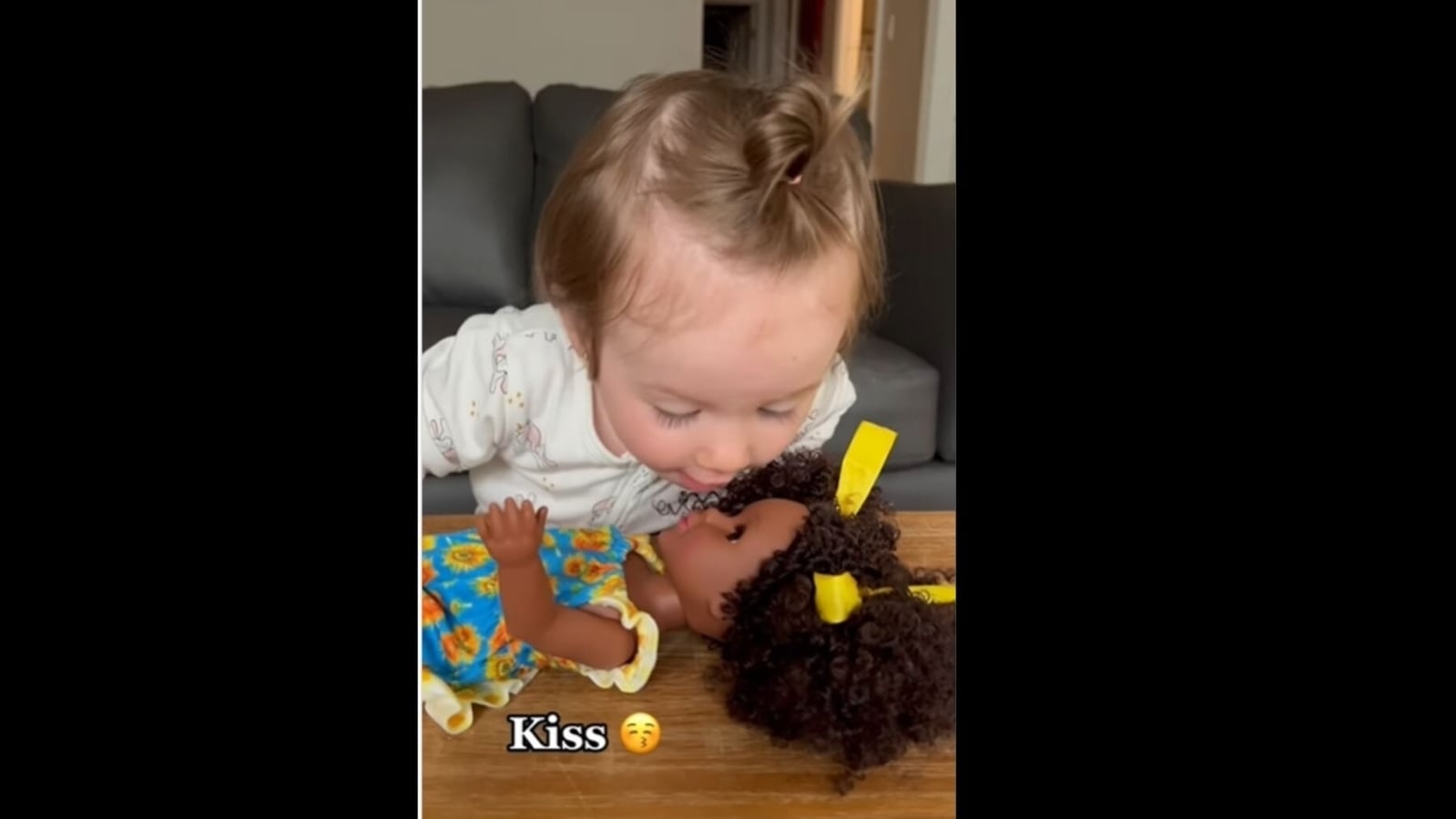 Toddler gets her first doll and her reaction is adorable to watch ...