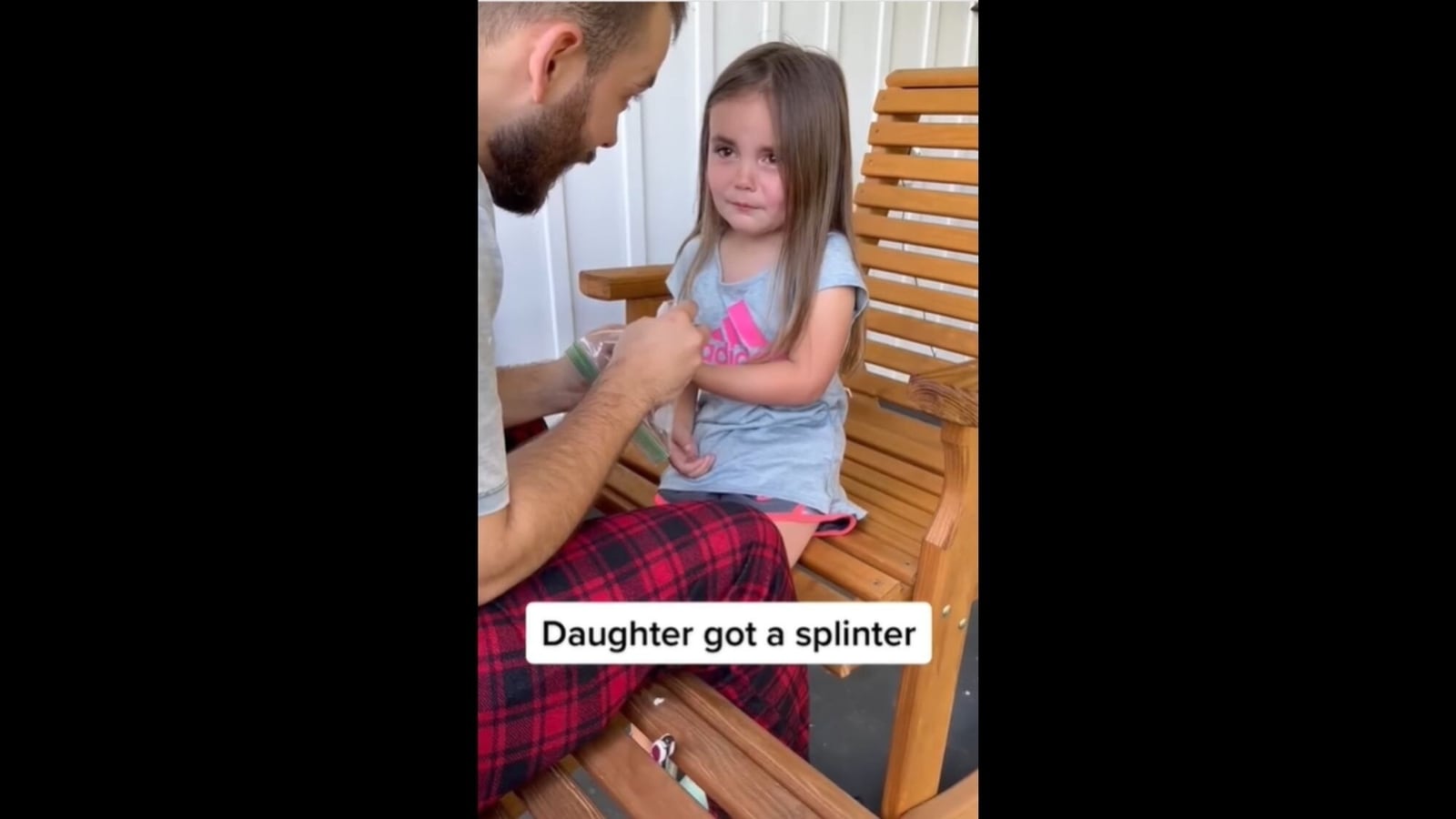 Little girl’s interaction with her father while removing a splinter is ...