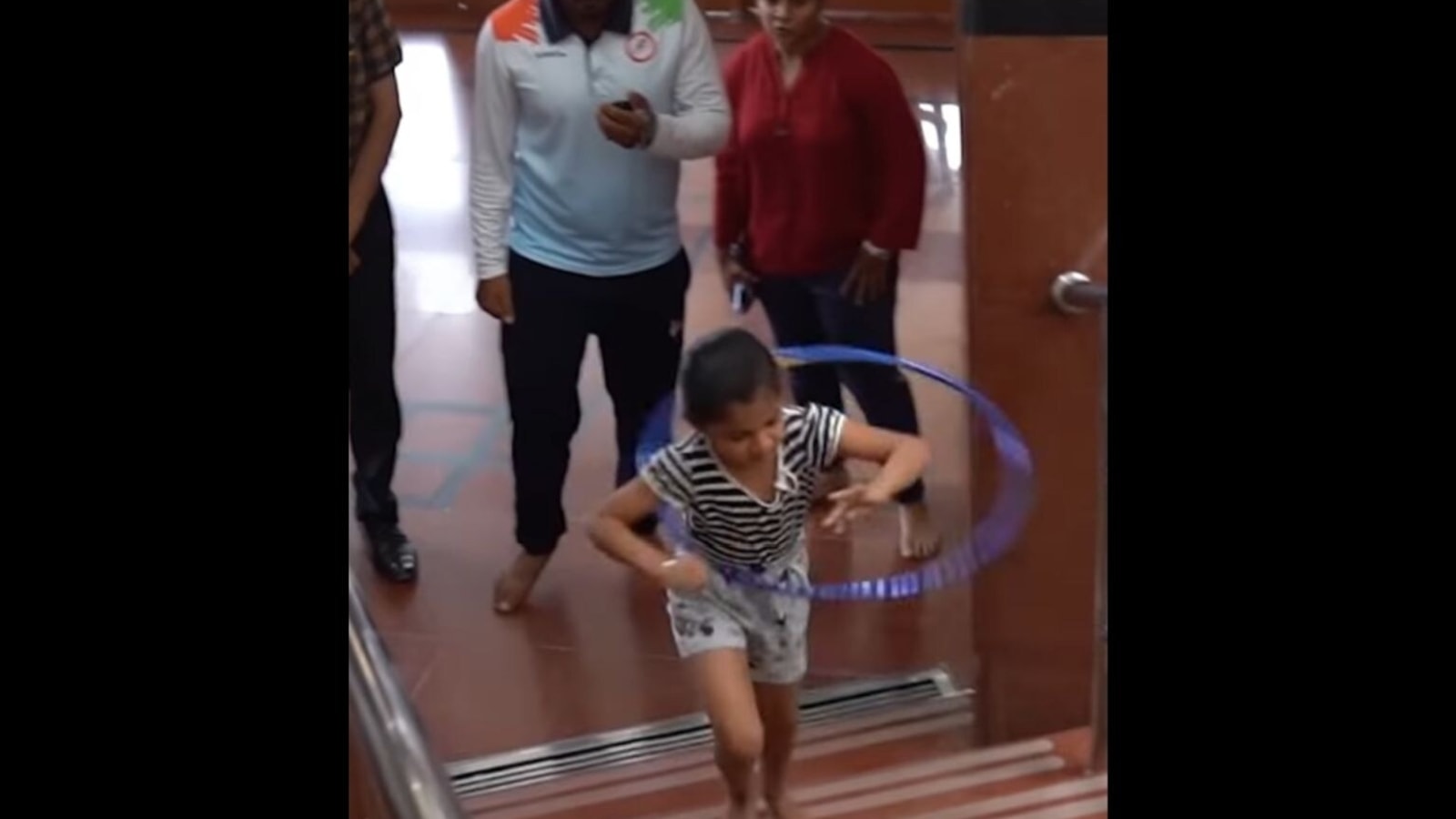 Indian girl climbs 50 stairs while hula hooping to create world record ...