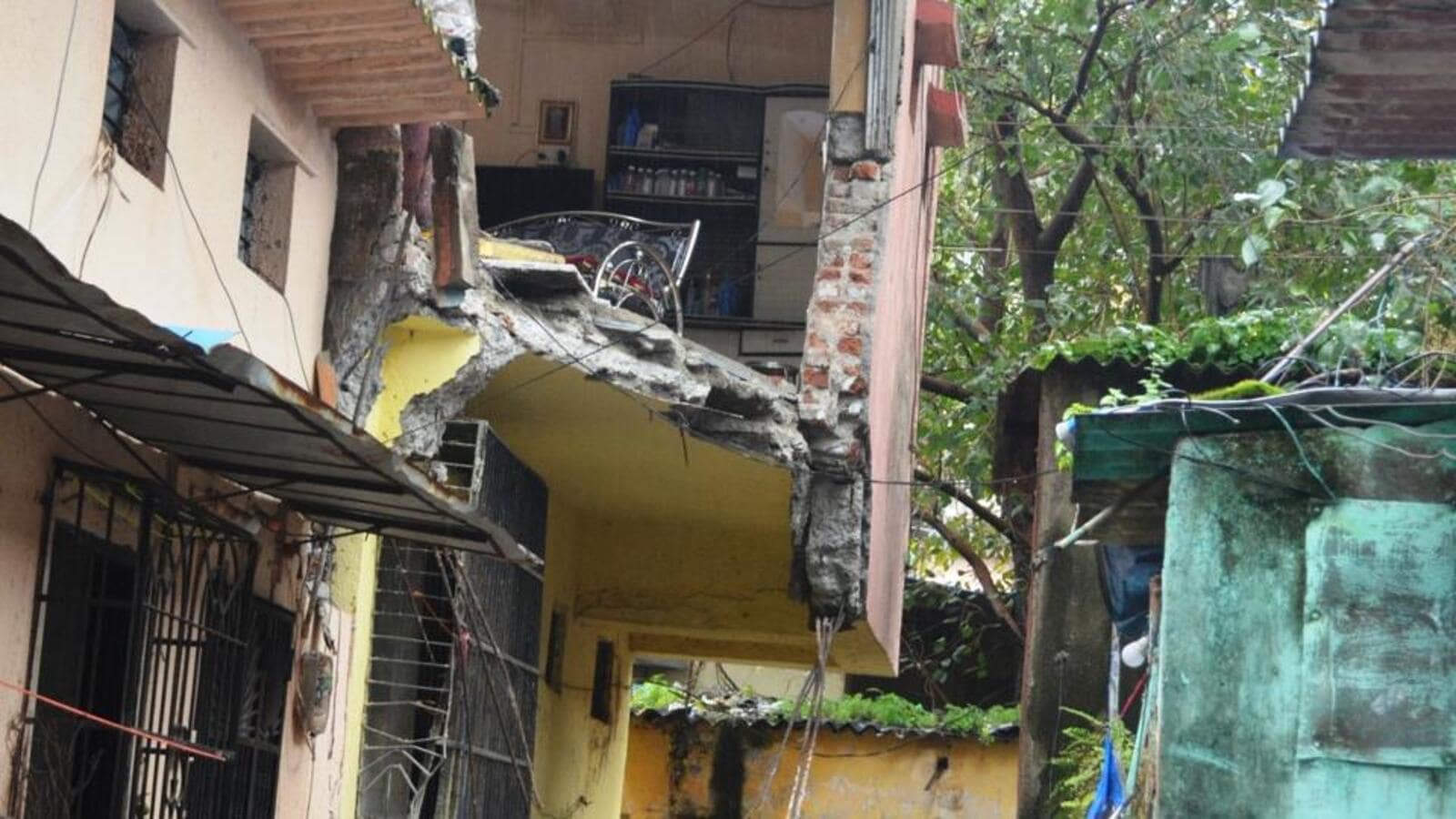 60-year-old dies after slab from adjacent building collapses on his ...