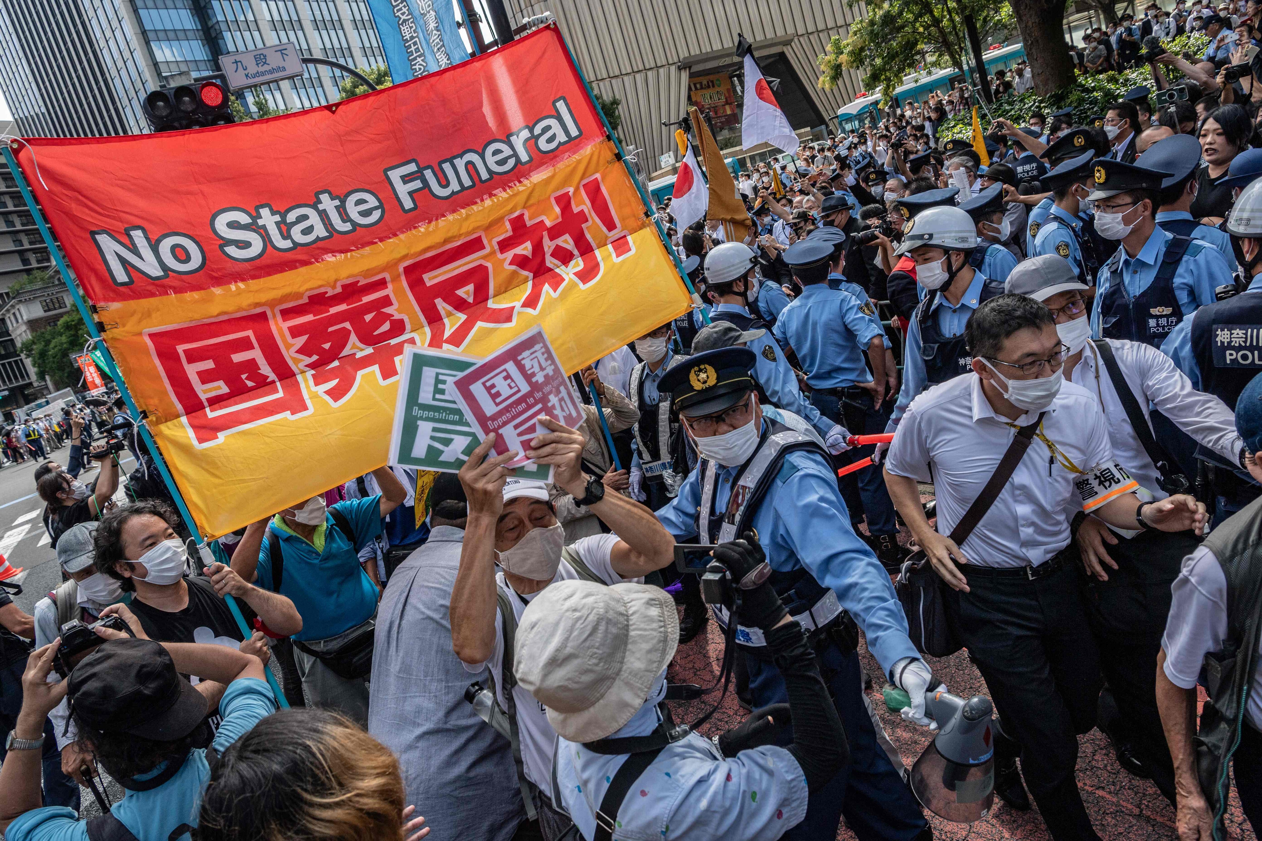 Massive protests as Japan honours ex-PM Shinzo Abe at costly state ...