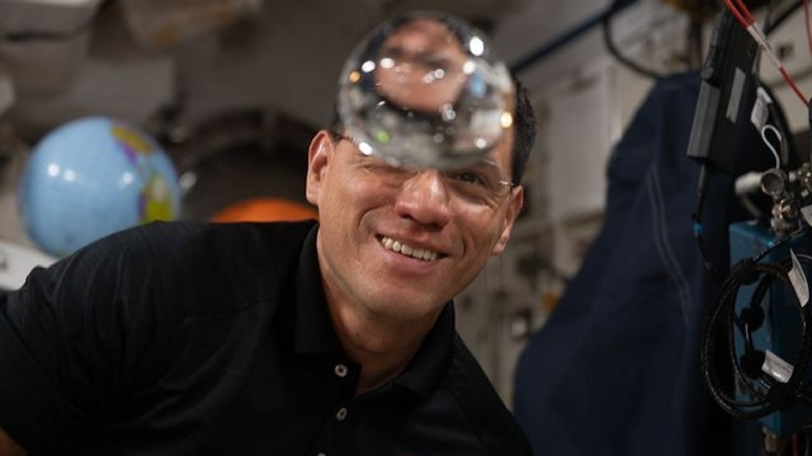 Astronauts have fun with free-flying water bubble, ISS shares pics ...