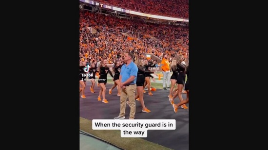 Security guard interrupts cheerleading performance. Video shows what ...
