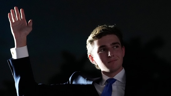 Barron Trump’s rally behaviour screams 'no spotlight please,' as dad ...