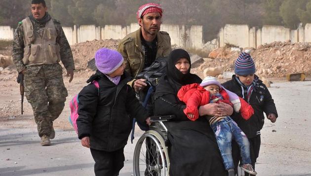 Thousands flee Syria’s Aleppo as Assad nears victory | World News