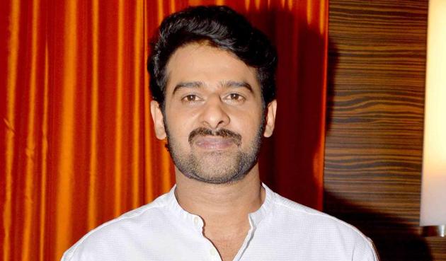 Prabhas fan cuts a special birthday cake, one with the actor’s photo ...