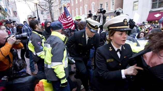Slogans against Donald Trump rock Washington; protesters smash stores ...
