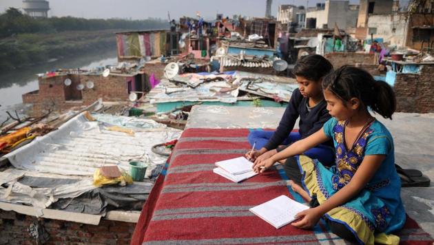 In pictures: A day in the life of slum dwellers | Hindustan Times
