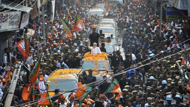 UP election 2017: People shower PM Modi with flowers, support during ...