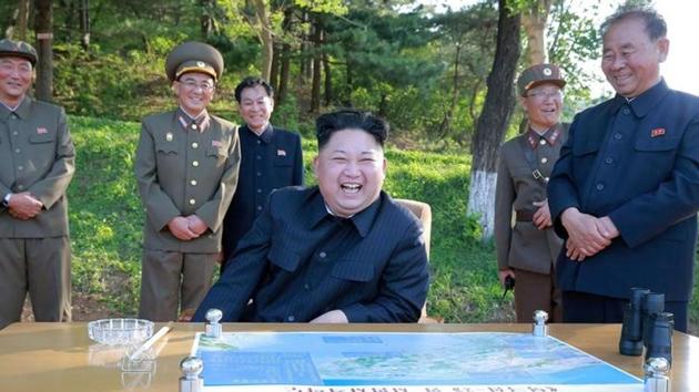 North Korea leader Kim Jong-Un guides test of new anti-aircraft weapon ...