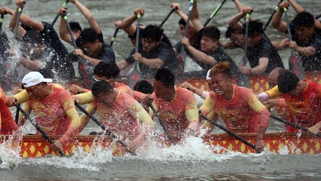 Photos: Colourful dragon boat festival held across China | Hindustan Times