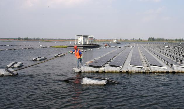 PHOTOS: China turns on the world’s largest floating solar farm ...