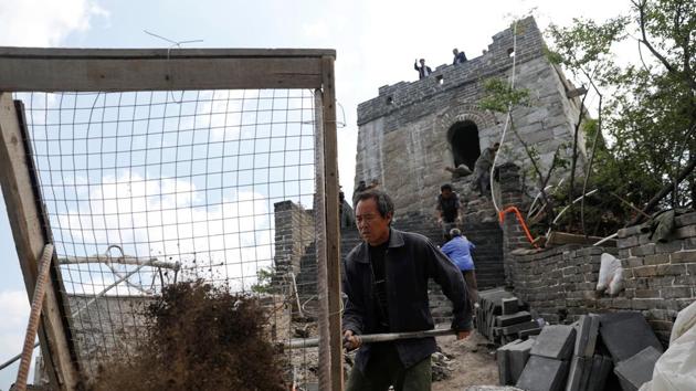 Photos: Rebuilding the Great Wall of China with immense drudgery ...