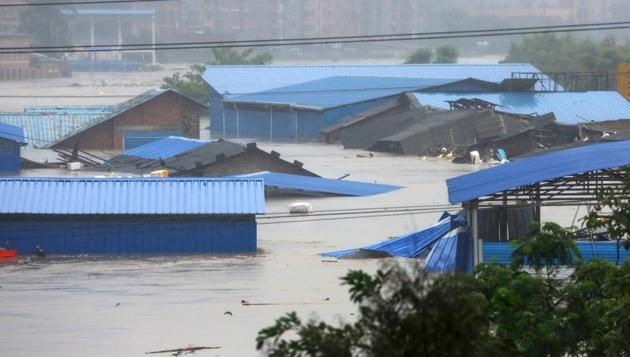 Photos: Floods in southern China kill 56, thousands displaced ...