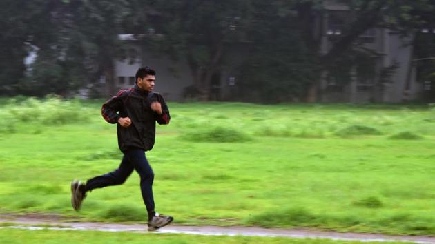 Photos: National boxing medallist struggles as paperboy in Pune ...