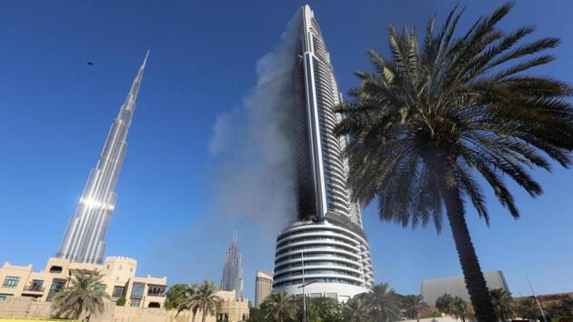 In pics: Blaze rips through Dubai skyscraper ‘The Marina Torch’ | World ...