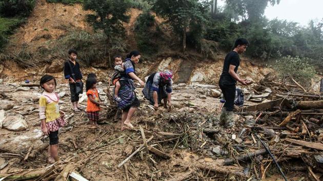 Photos: Flash floods, landslides kill dozens in Vietnam, many missing ...