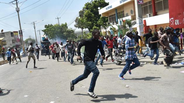 Photos: Violent protests in Port-au-Prince over Haiti’s new budget ...