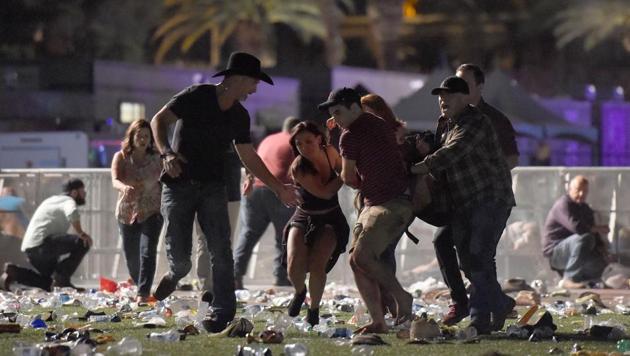 Las Vegas shooting: Videos show concert-goers fleeing, ducking for ...