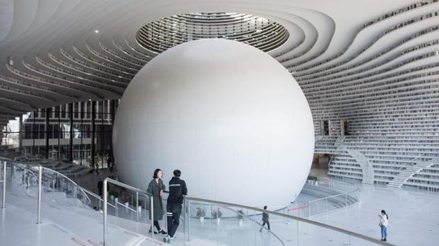 Photos: China’s futuristic Binhai library is less books, more fiction ...