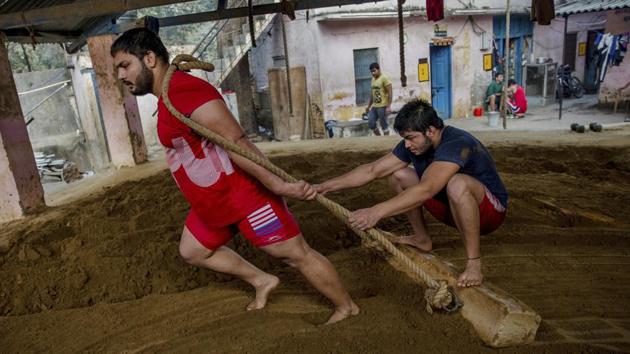 Photos: At akhadas, ancient wrestling helps some grapple at a future ...