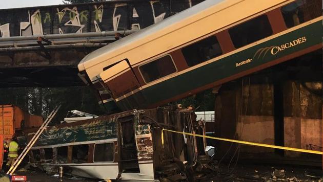 Amtrak train derails on highway bridge in Washington state, at least 6 ...