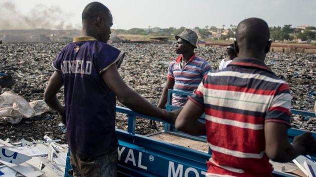 Photos: A Ghanaian artist’s project to turn toxic e-waste into art ...