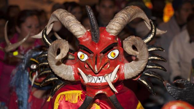 How an Ecuadorean village rings in the New Year with a devil dance | Travel