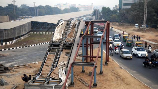 Signature Tower foot overbridge gets escalators, pedestrians heave a ...
