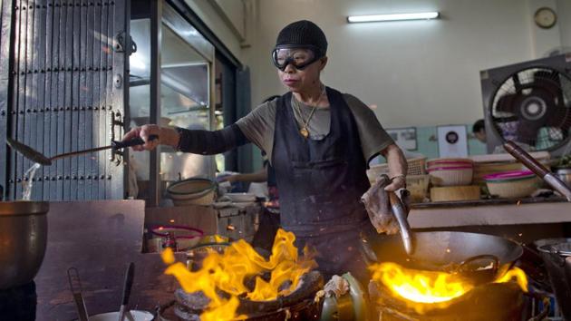 This Thai chef who cooks in an outdoor kitchen gets Michelin star for ...