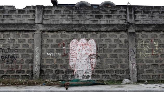 Photos: Night in Philippine slum revives spectre of Duterte’s drug war ...