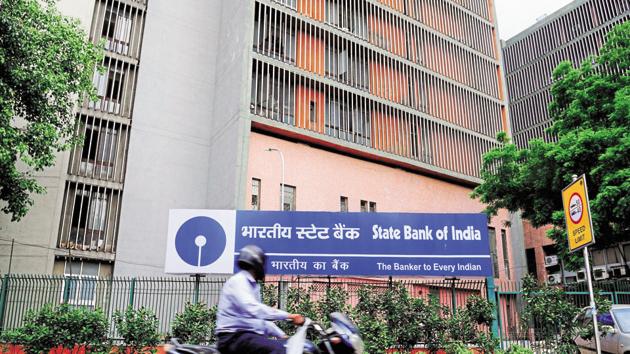 State Bank of India posts surprise loss in third quarter | Business News