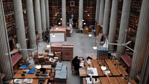 Photos: At 100, Greece library makes a historic trip to Athens ...