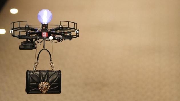 Dolce & Gabbana replaces models with drones to carry handbags down the ...